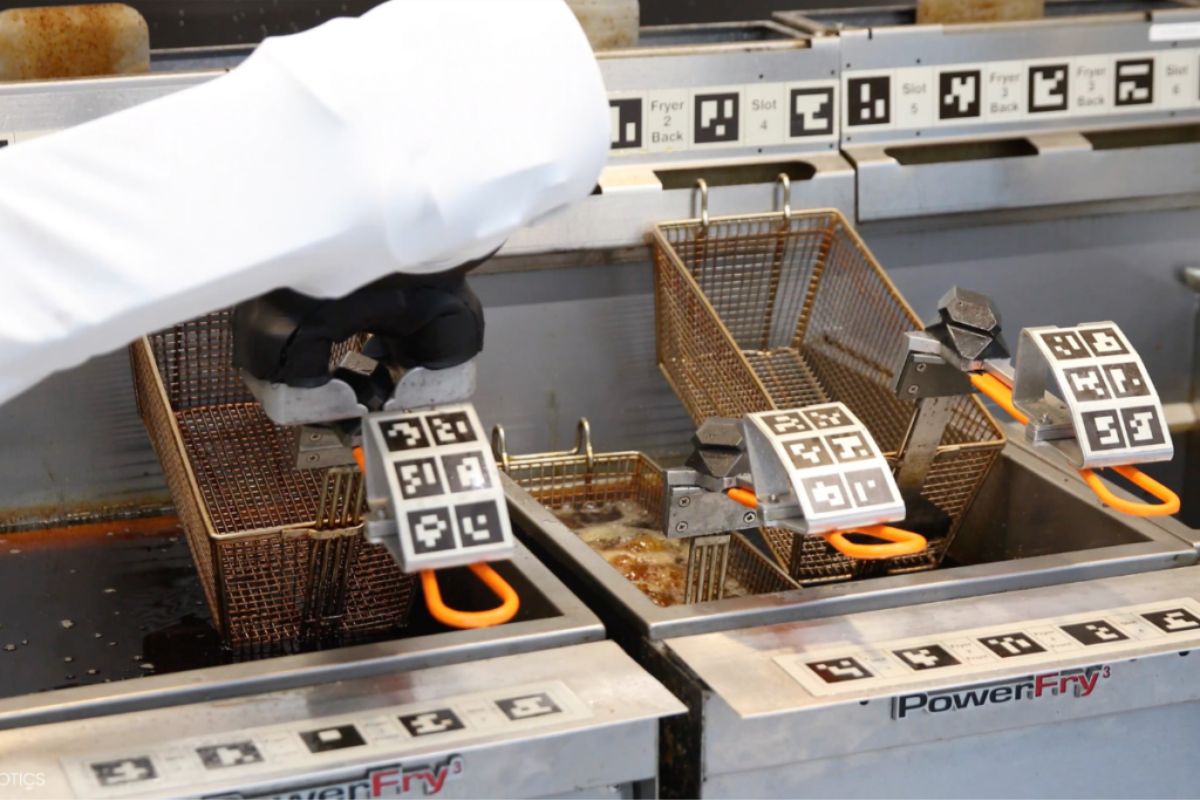 Another Wing Chain Installs Robot at the Frying Station - Foodservice ...
